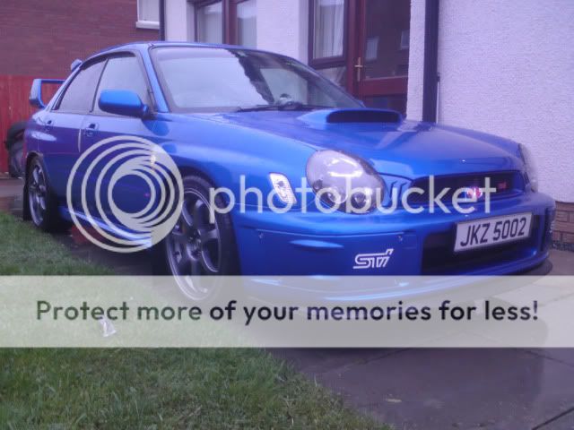 does anyone have a front splitter attached to your bugeye prodrive lip ...